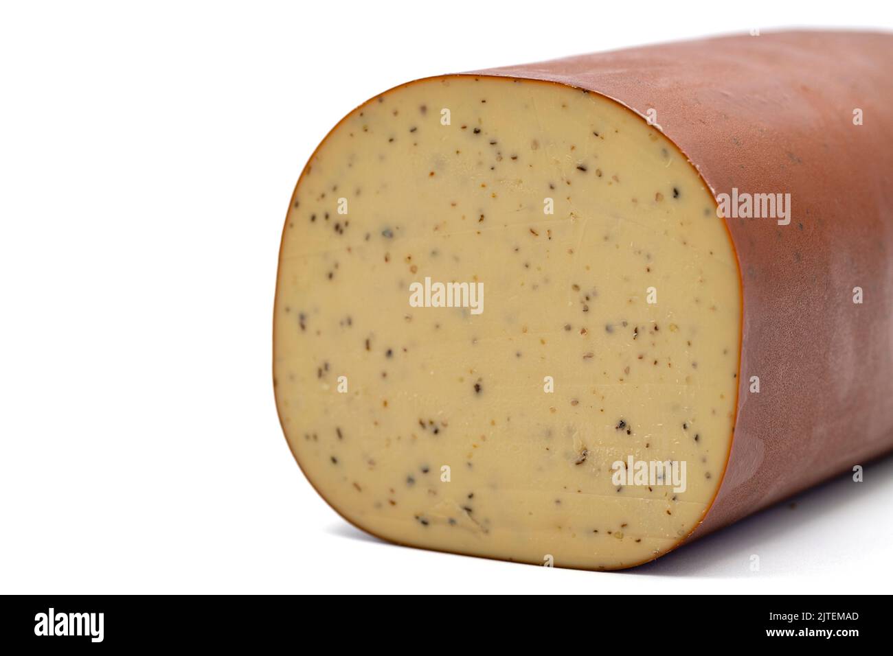 Black Pepper Smoked Cheese. Dutch smoked cheese isolated on a white ...