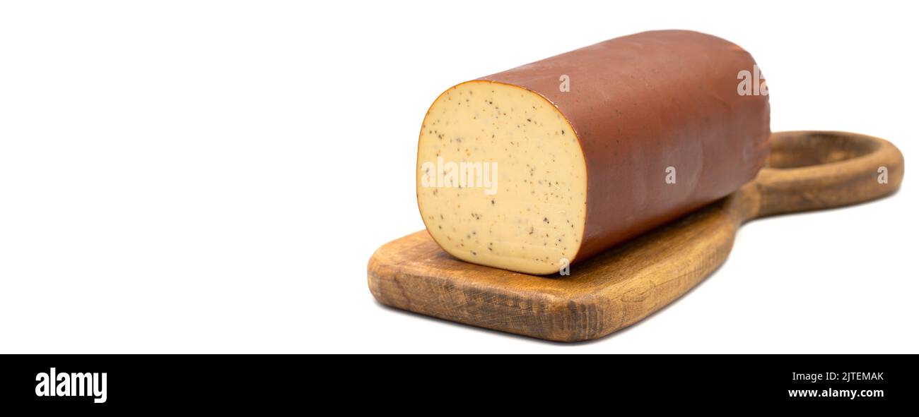 Black Pepper Smoked Cheese. Dutch smoked cheese isolated on a white ...
