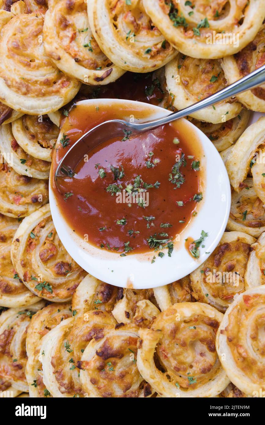 buffet with pizza snails and ketchup sauce Stock Photo - Alamy