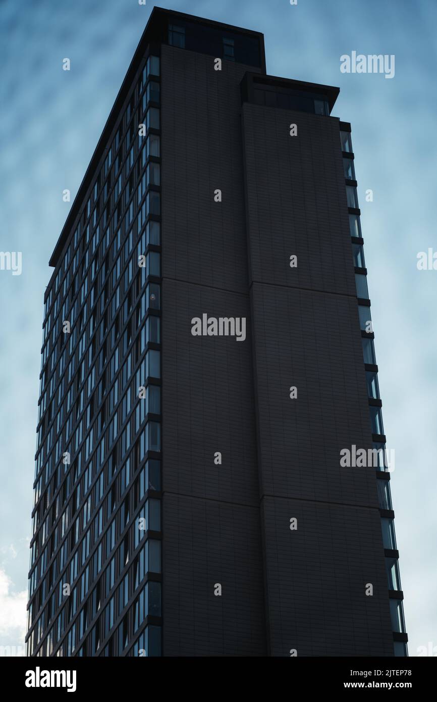 A vertical shot of the Tower Block, taken in Sheffield through chain ...