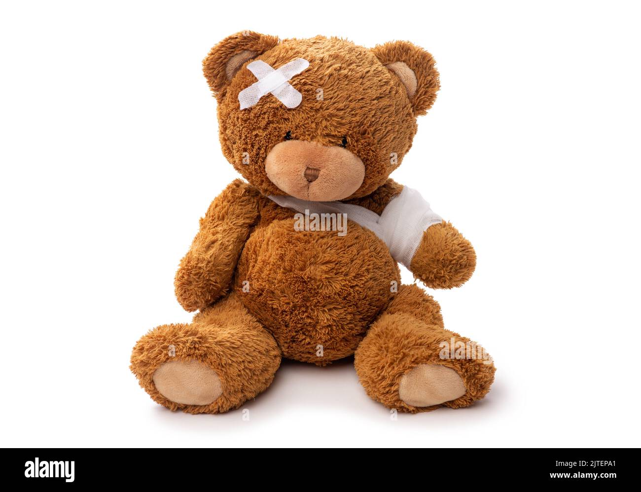 teddy bear toy with bandaged paw and patch on head Stock Photo - Alamy