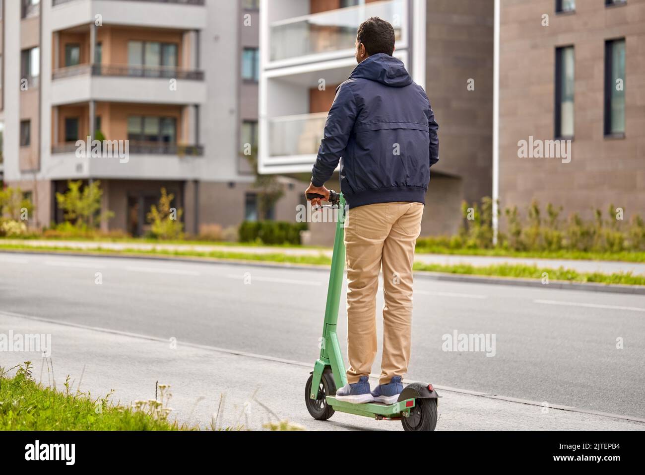 Indian man riding scooter hi-res stock photography and images - Alamy