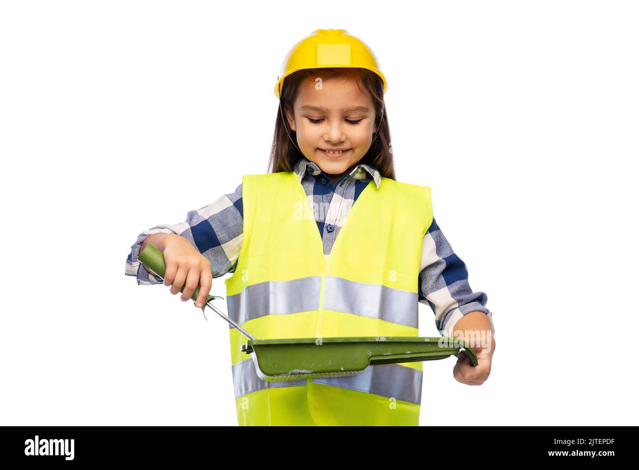 girl in helmet and safety vest with paint roller Stock Photo - Alamy