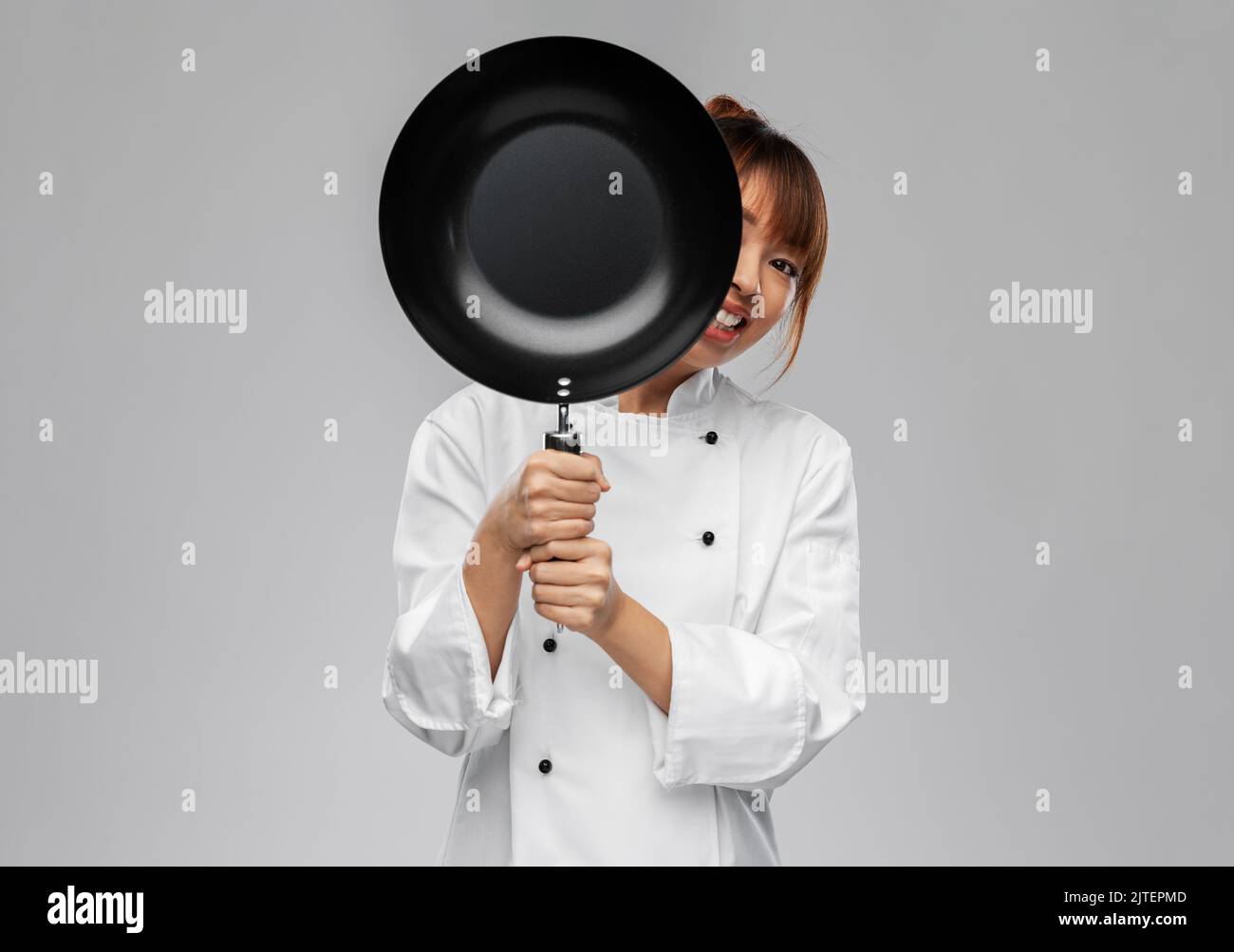 Female chef hiding behind hi-res stock photography and images - Alamy