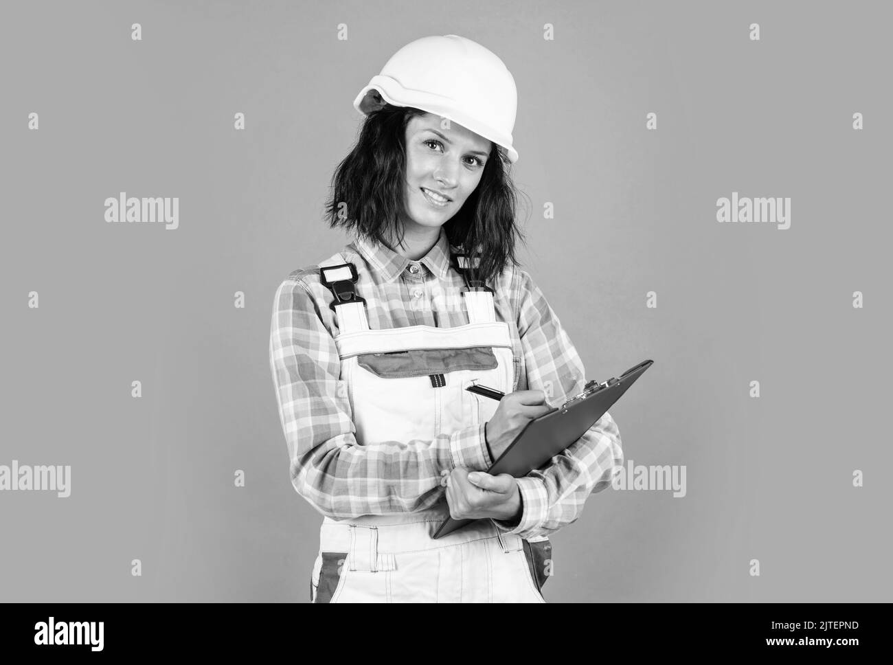 engineering education. female worker in working uniform. cheerful woman ...