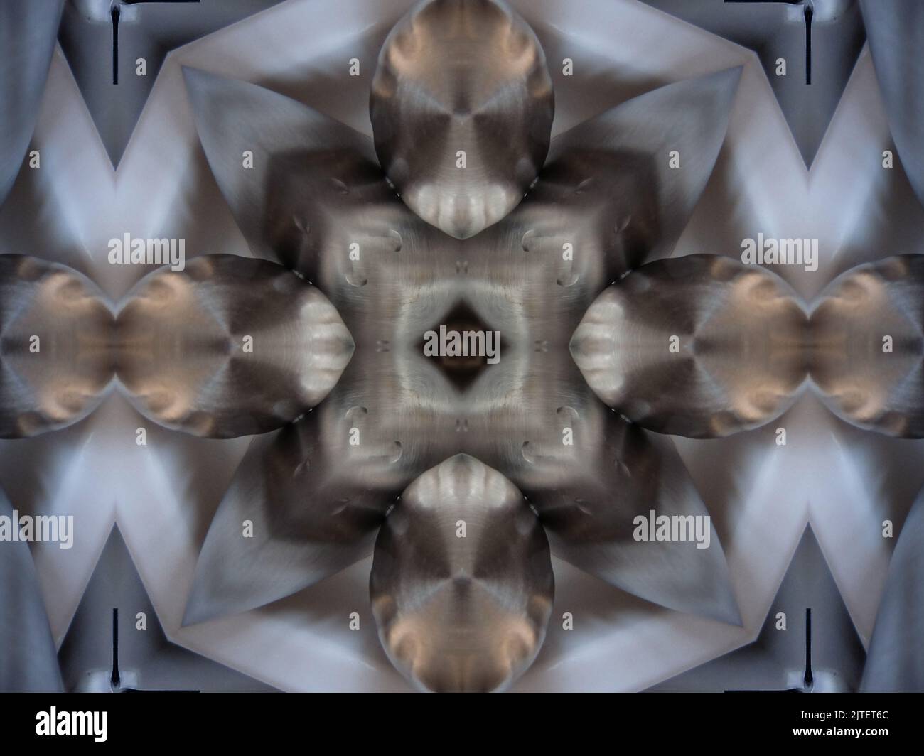 A diffuse kaleidoscope repeat pattern of reflective metal surfaces for ...