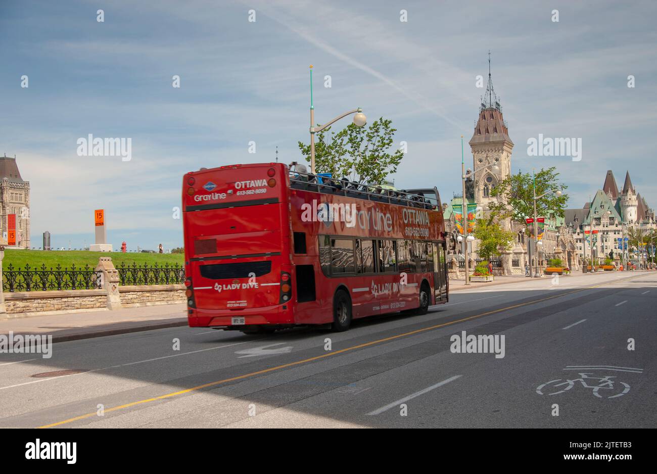 Tour bus going down the road hi-res stock photography and images - Alamy