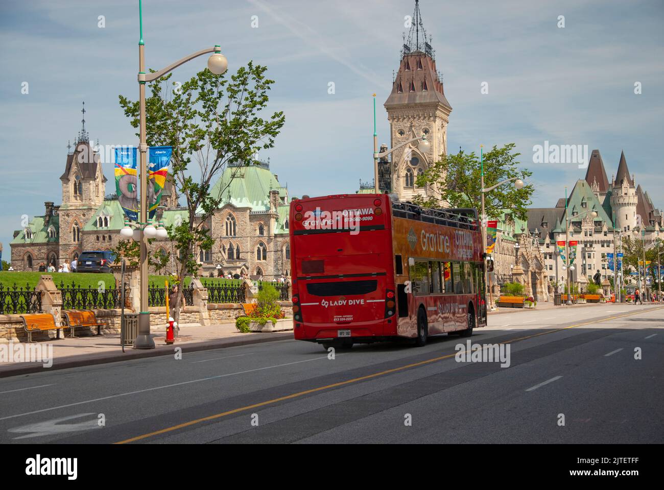 Tour Bus Going East Along Wellington Street With Parliament Buildings ...