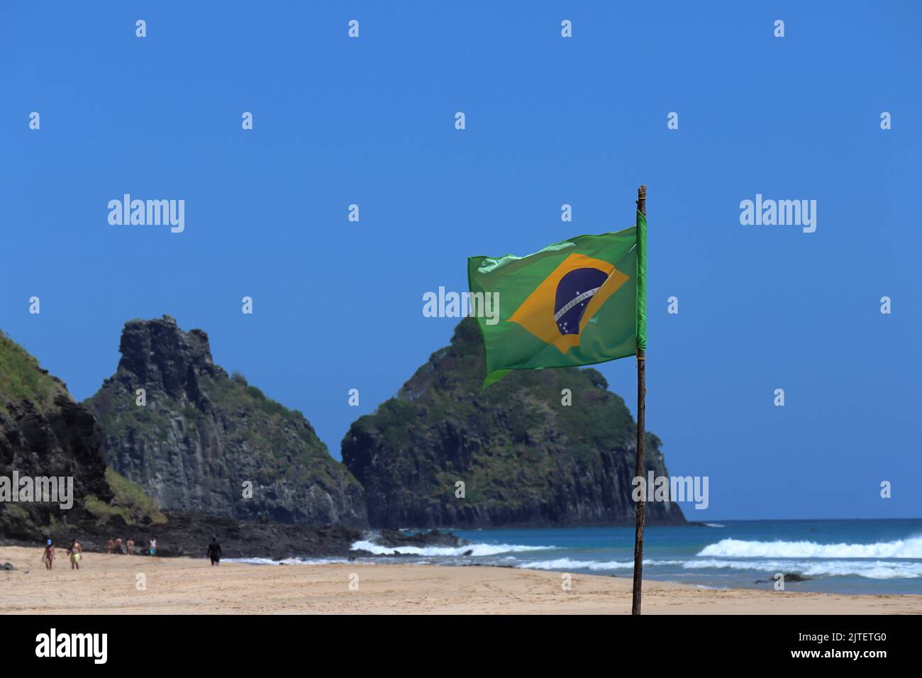 Beautiful view of Morro do 2 Irmaos with the Brazilian Flag waving in ...