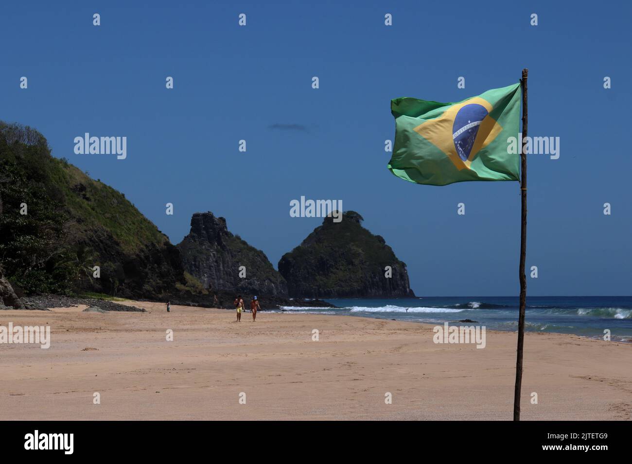 Beautiful view of Morro do 2 Irmaos with the Brazilian Flag waving in ...