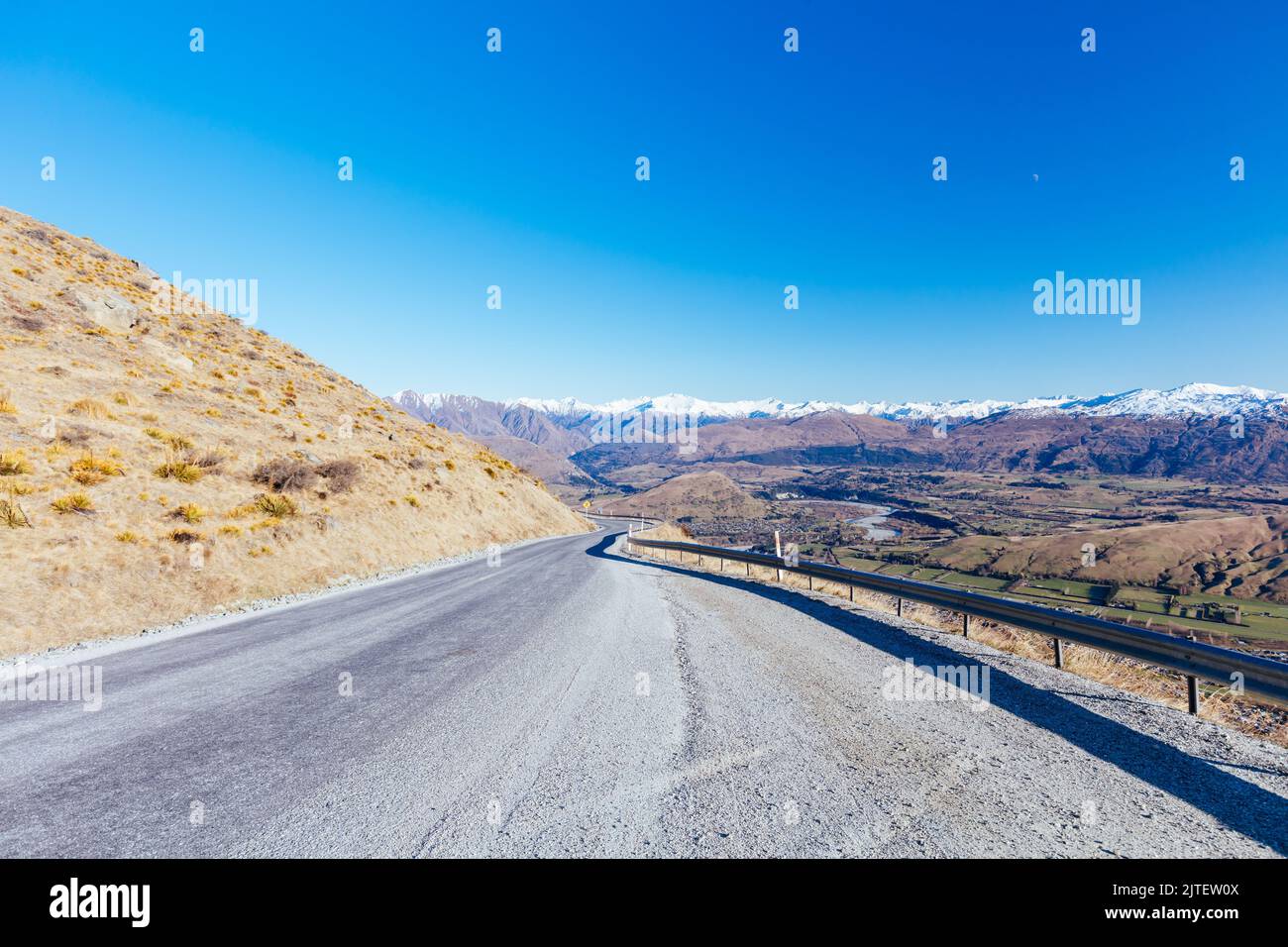 The view over Queenstown and Lake Hayes from the Remarkables on a sunny ...