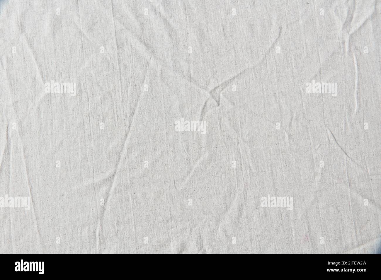 White crumpled linen cloth background Stock Photo - Alamy