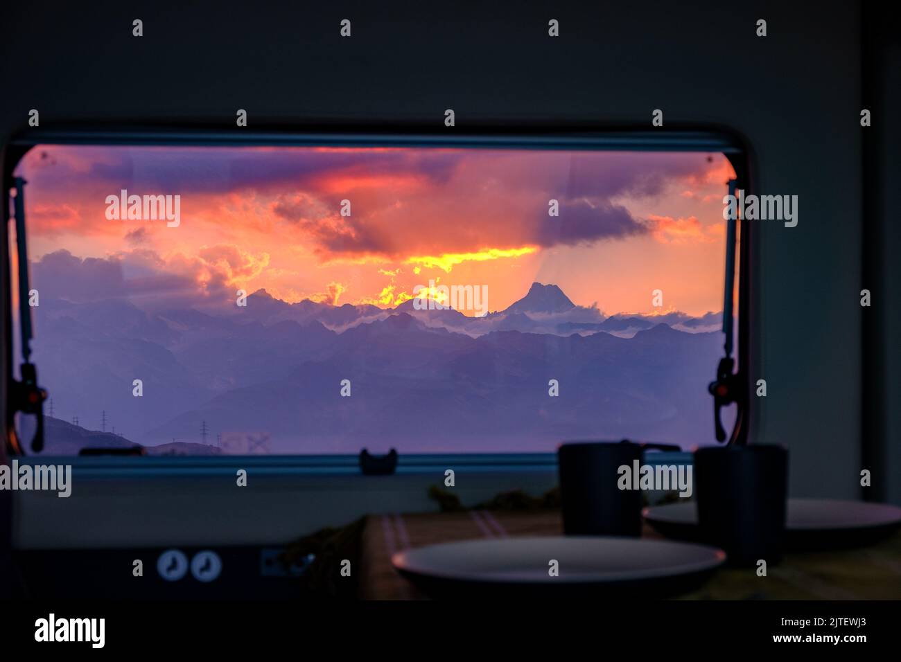 Sunset from a van window Stock Photo - Alamy