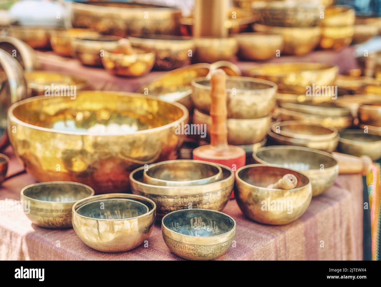 Beautiful tibetan bowl ready for meditative music Stock Photo - Alamy