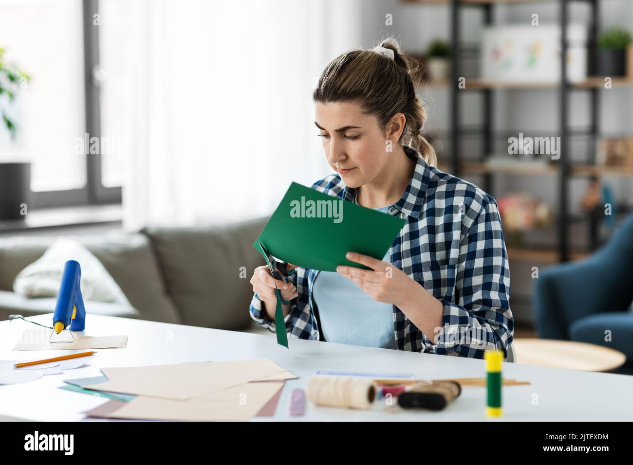 woman making paper craft at home Stock Photo - Alamy