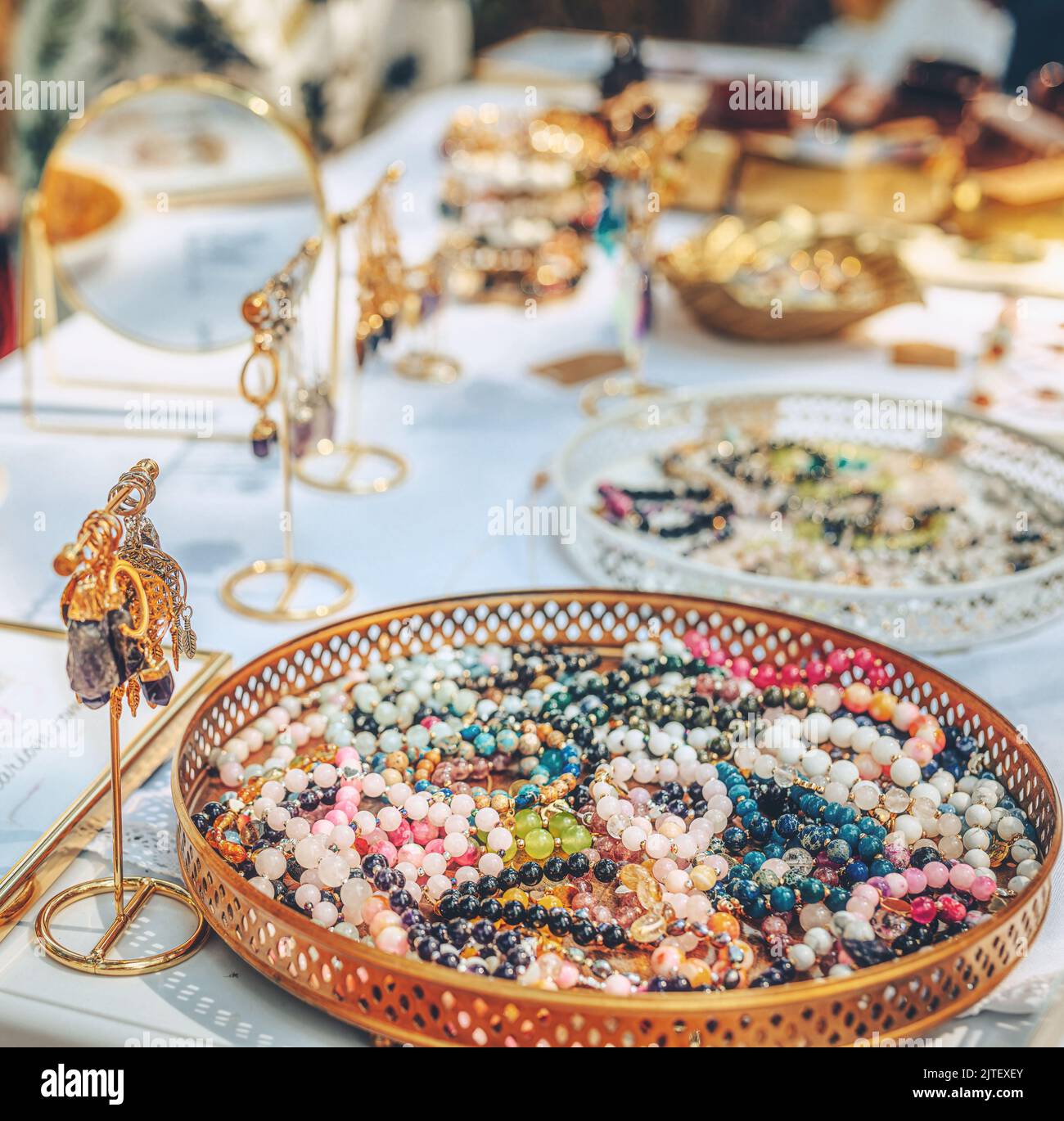 beautiful jewelry on the table, jewelry with healing stones Stock Photo ...