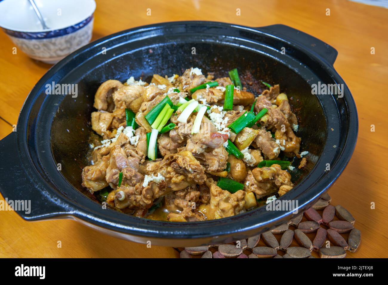 A delicious Cantonese dish, Kee Kee Sand Ginger Chicken Casserole Stock ...