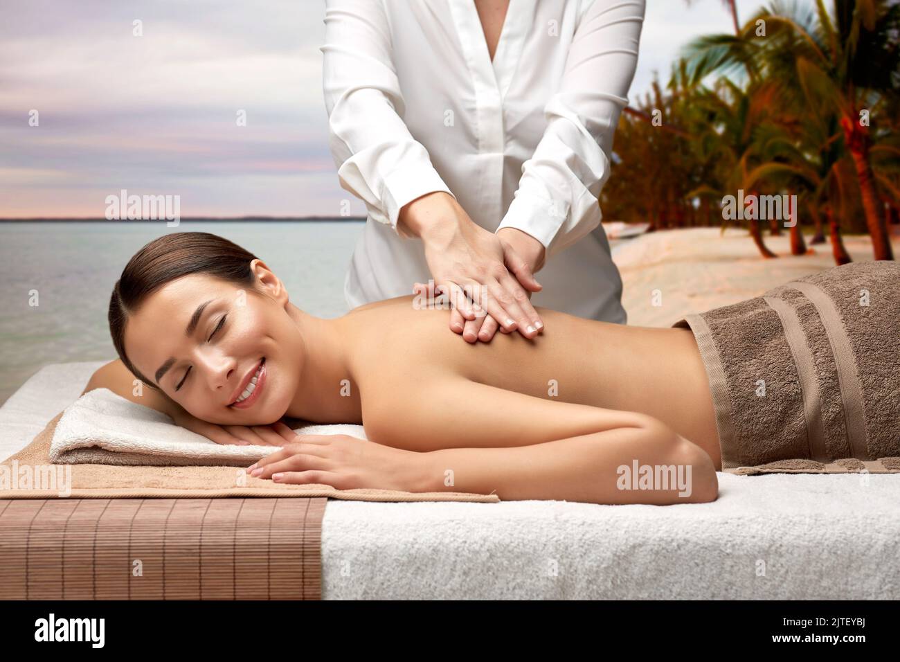 Woman back massage spa outdoors hi-res stock photography and images - Alamy