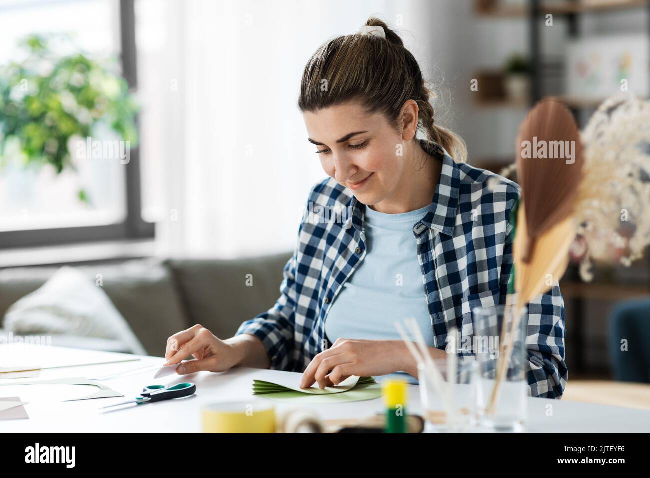 woman making paper craft at home Stock Photo - Alamy