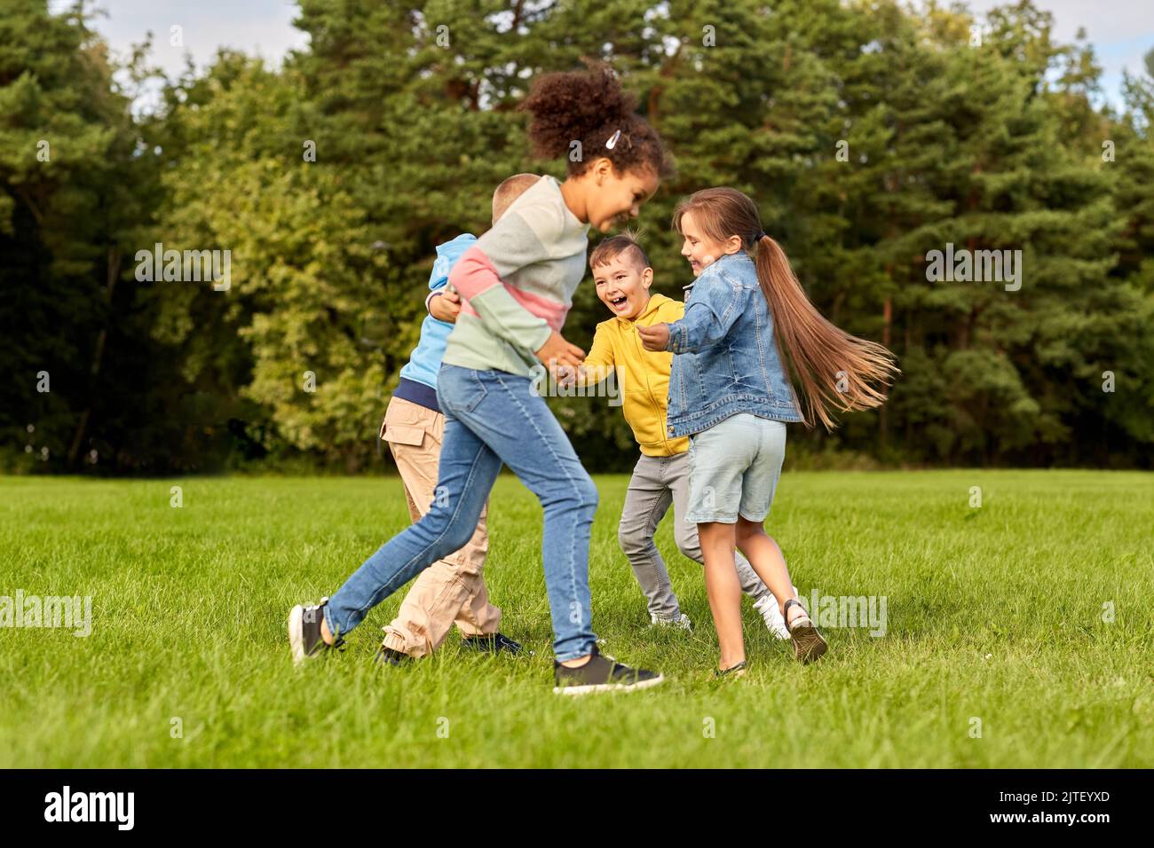 happy children playing and having fun at park Stock Photo - Alamy