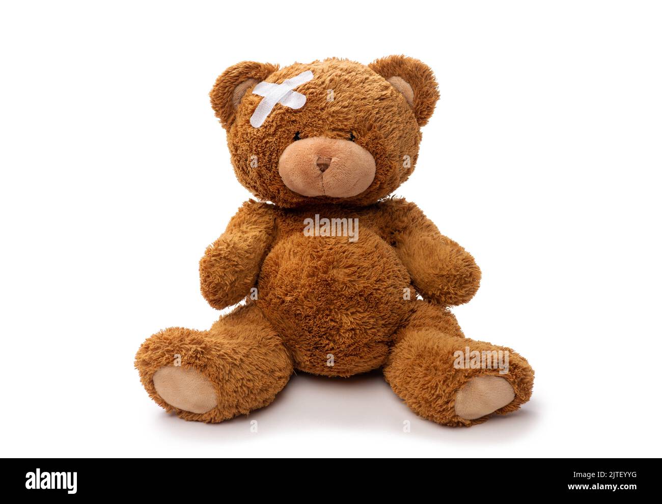 teddy bear toy with medical patch on head Stock Photo - Alamy