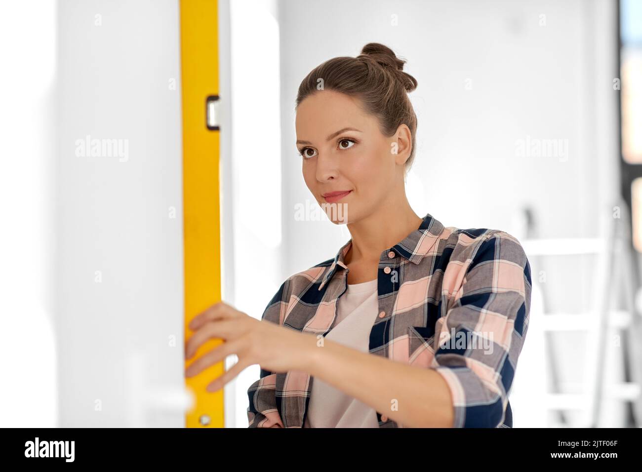 Woman worker level hi-res stock photography and images - Alamy