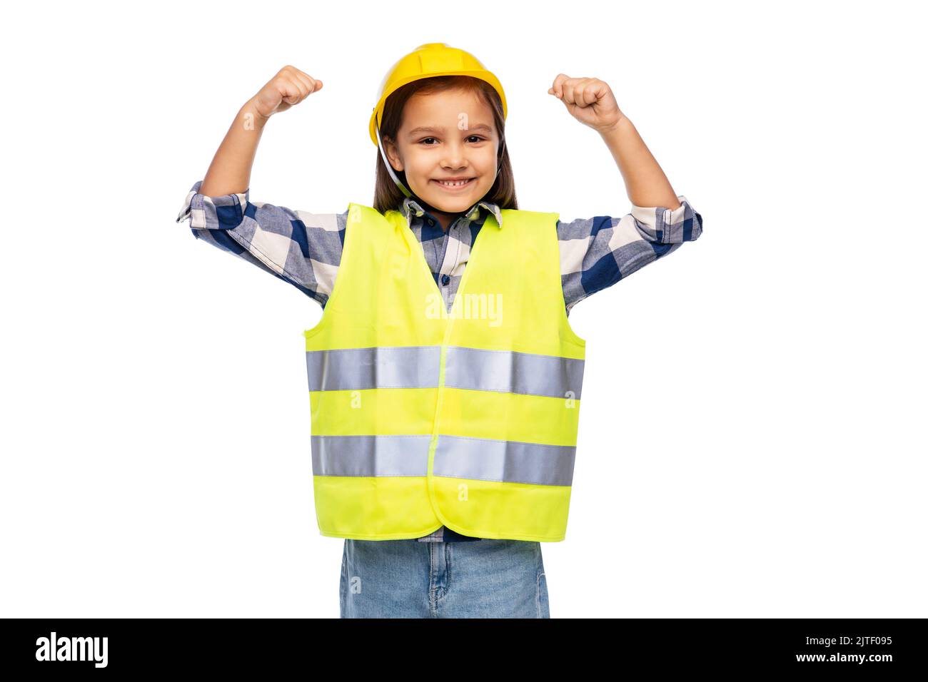 girl in helmet and safety vest showing power Stock Photo - Alamy