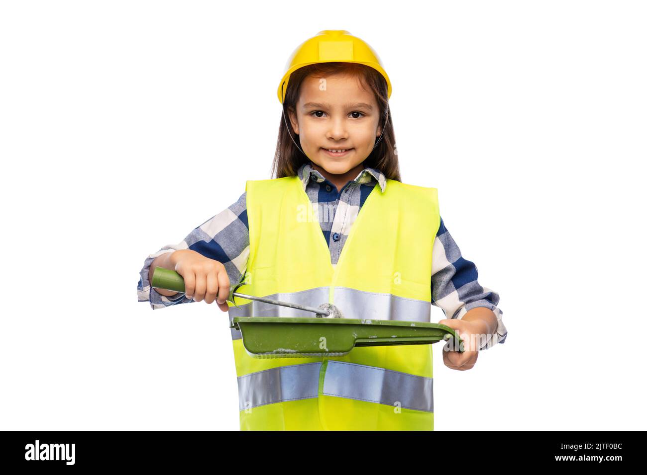 girl in helmet and safety vest with paint roller Stock Photo - Alamy