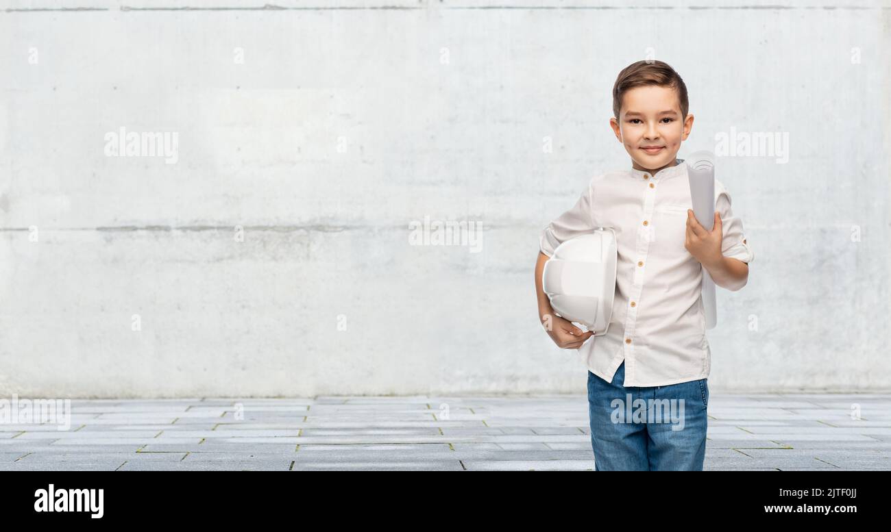 little boy with construction helmet and blueprint Stock Photo - Alamy
