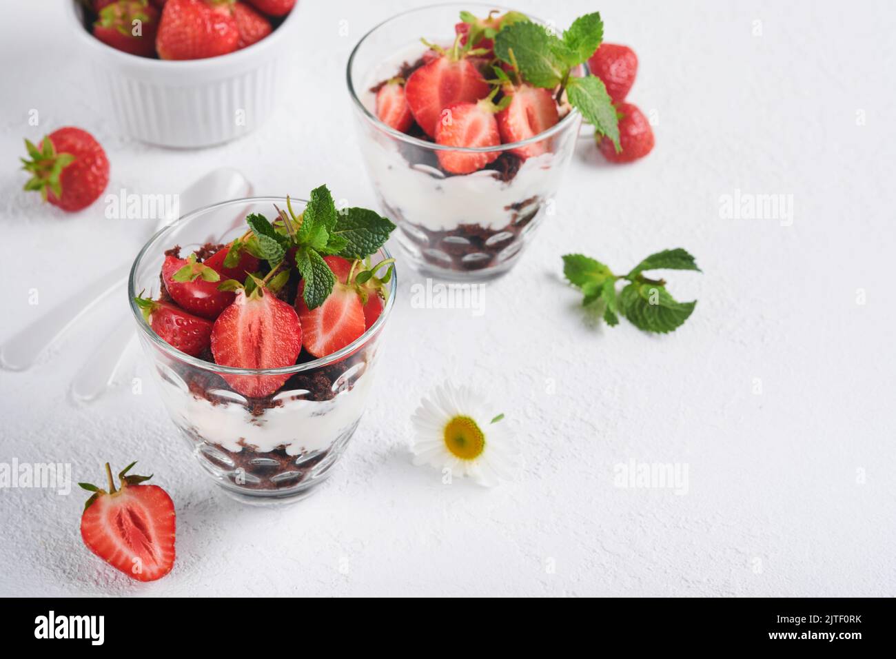 Trifles. Brownies, fresh strawberry and mascarpone cream servered in ...