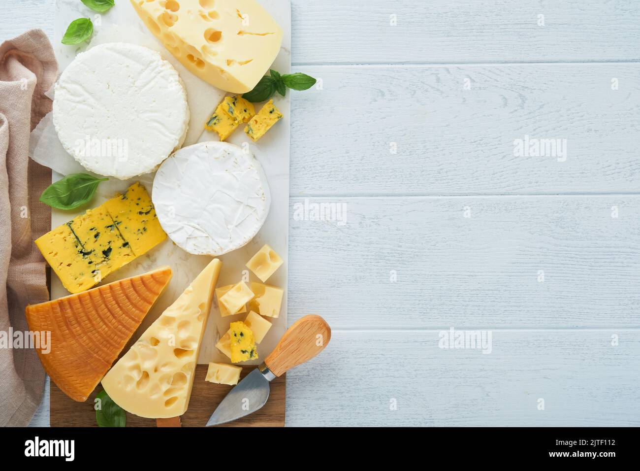 Set or assortment cheeses. Maasdam, smoked cheese, camembert, blue ...