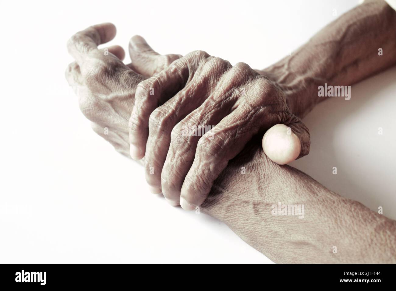 Elderly woman suffering from pain isolated on white Stock Photo - Alamy