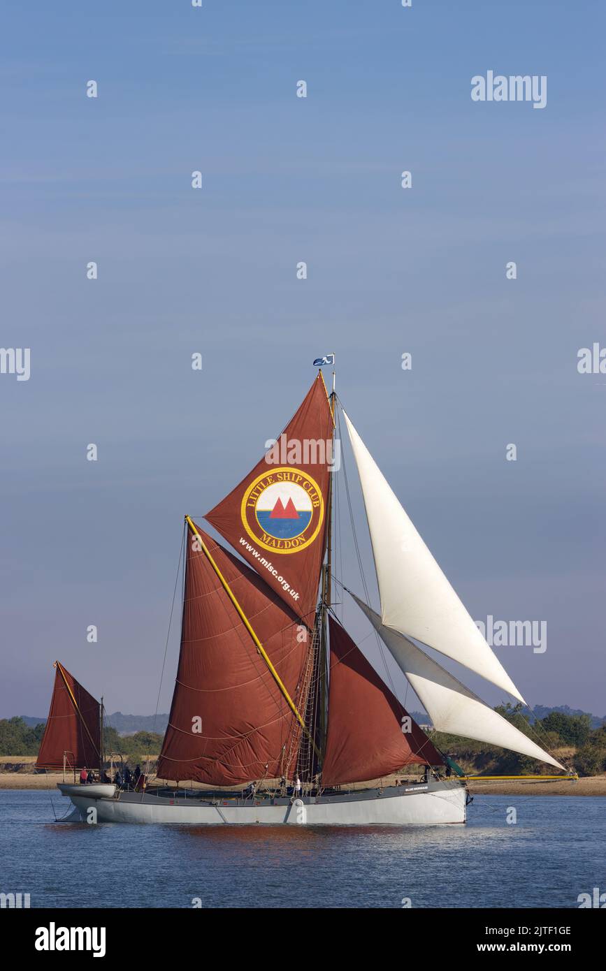 The Thames sailing barge Blue Mermaid in full sail on the river ...