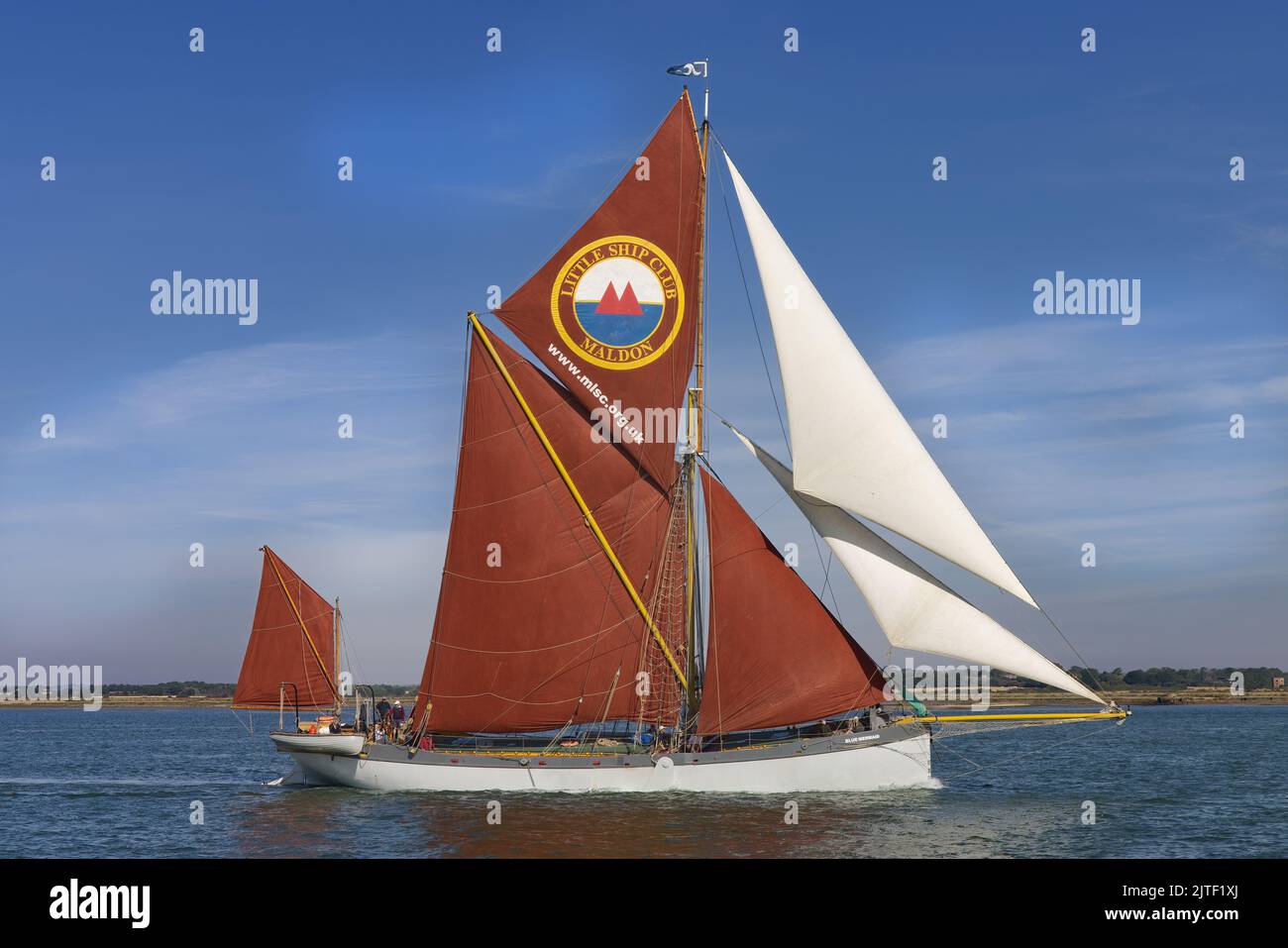 The Thames sailing barge Blue Mermaid in full sail on the river ...