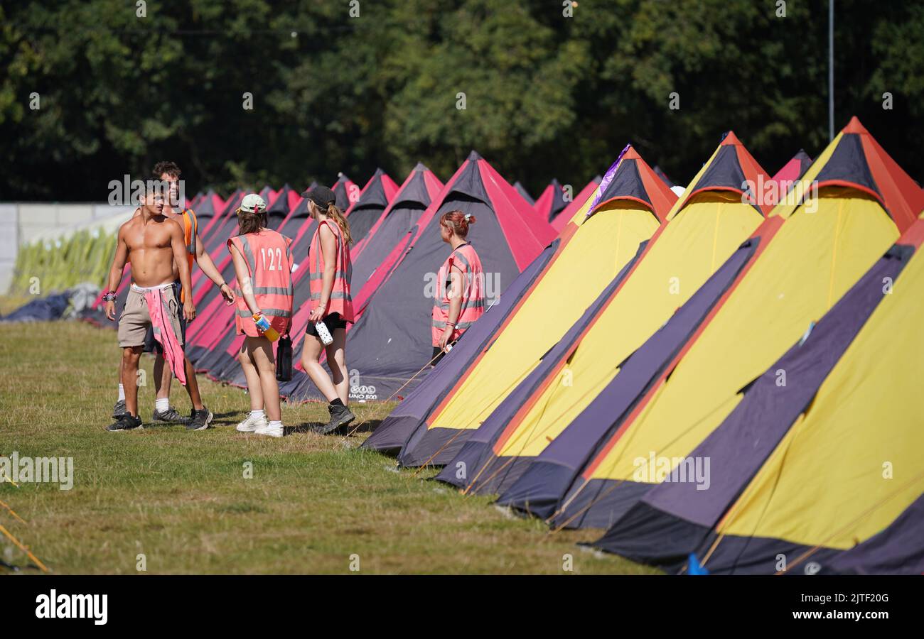 Staff erecting the VIP camping area during a media preview of the ...