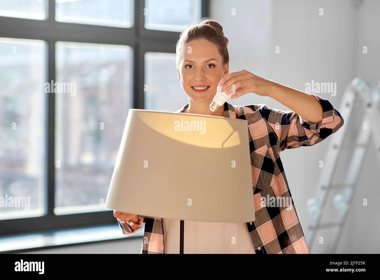 Changing lightbulb hi-res stock photography and images - Alamy