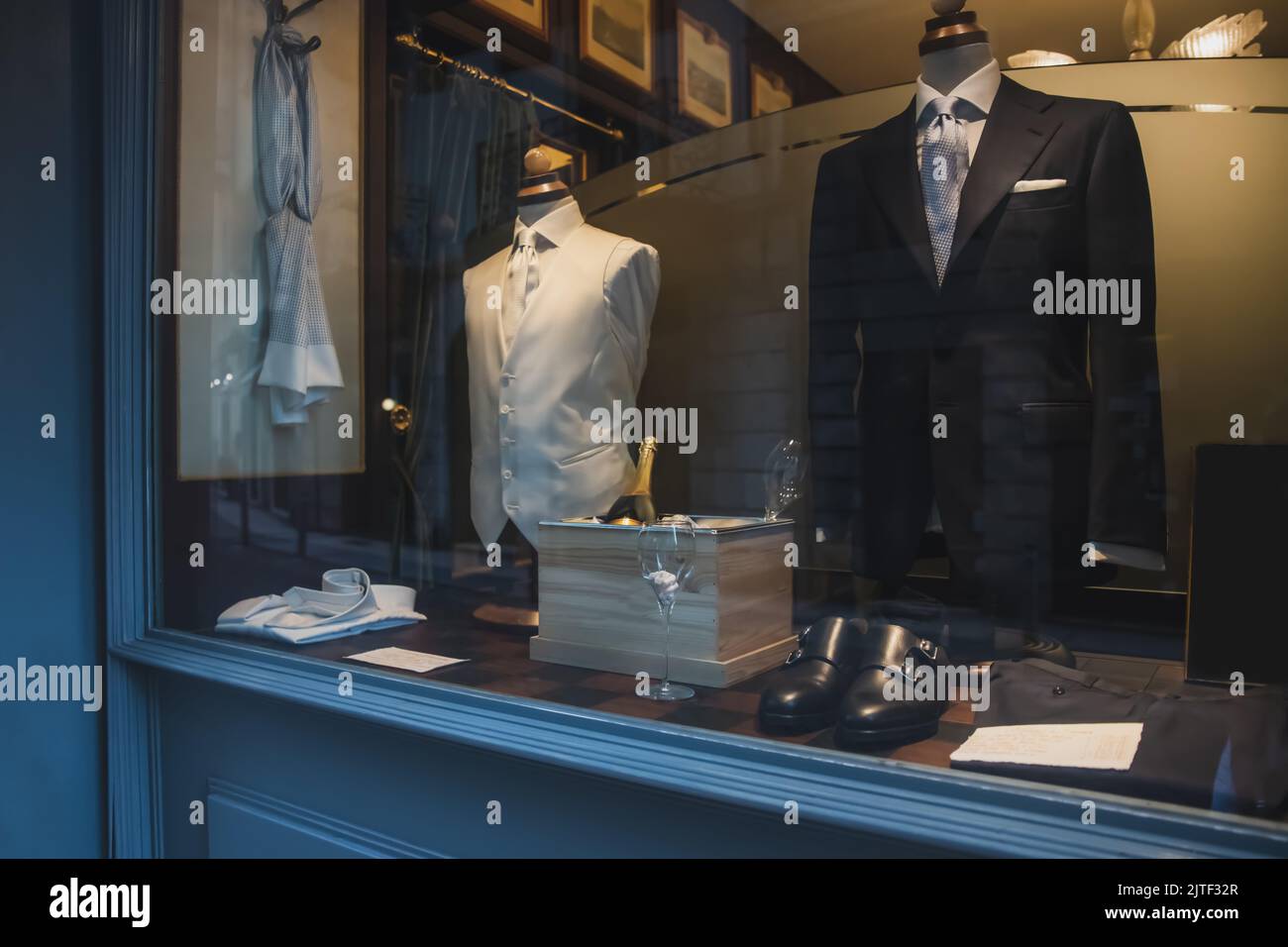 Luxury shop window with Stylish men's suits in Italy Stock Photo - Alamy