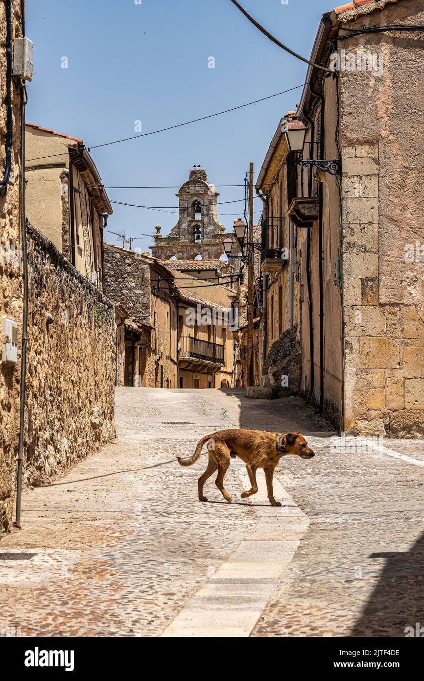 Medieval village with stone houses, cobblestone streets, old doors and ...