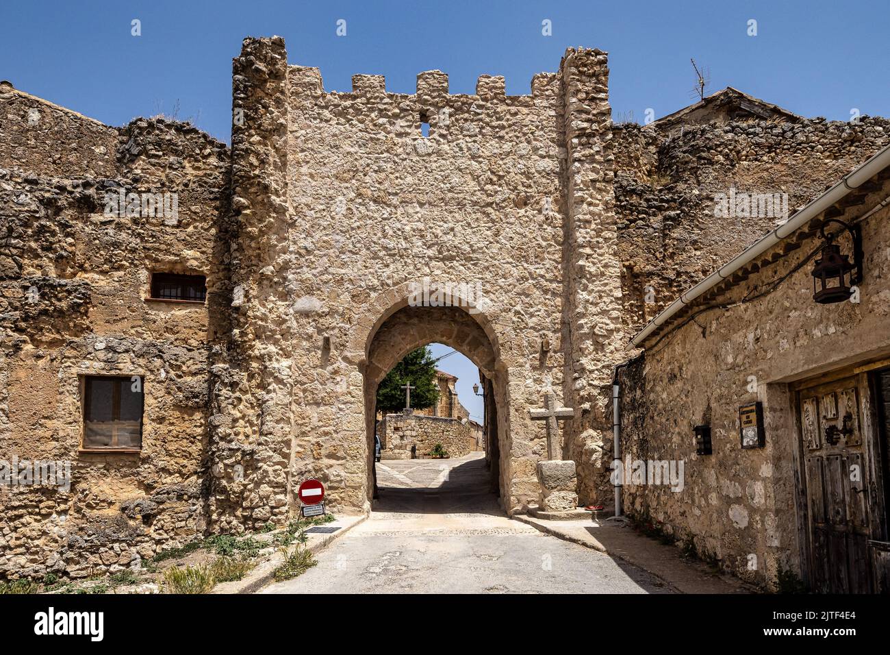Medieval village with stone houses, cobblestone streets, old doors and ...