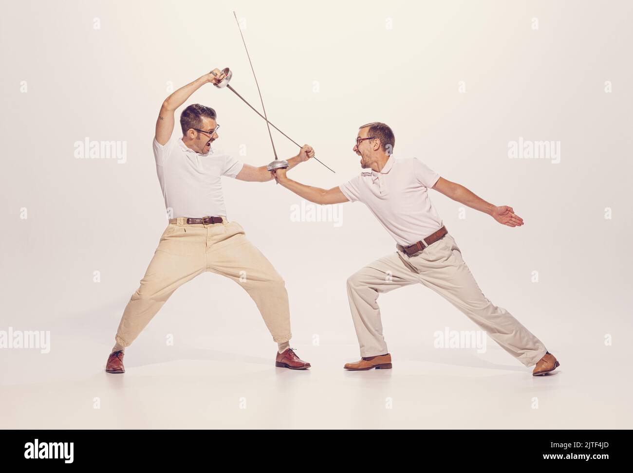 2 People Fighting With Swords