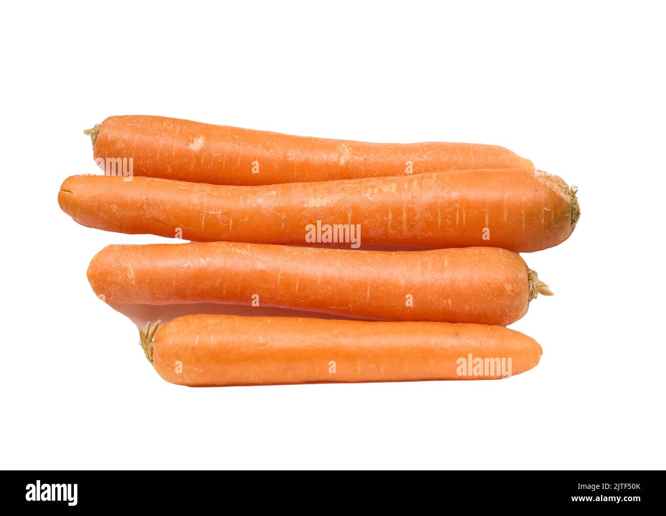 Four carrots isolated on white background Stock Photo - Alamy