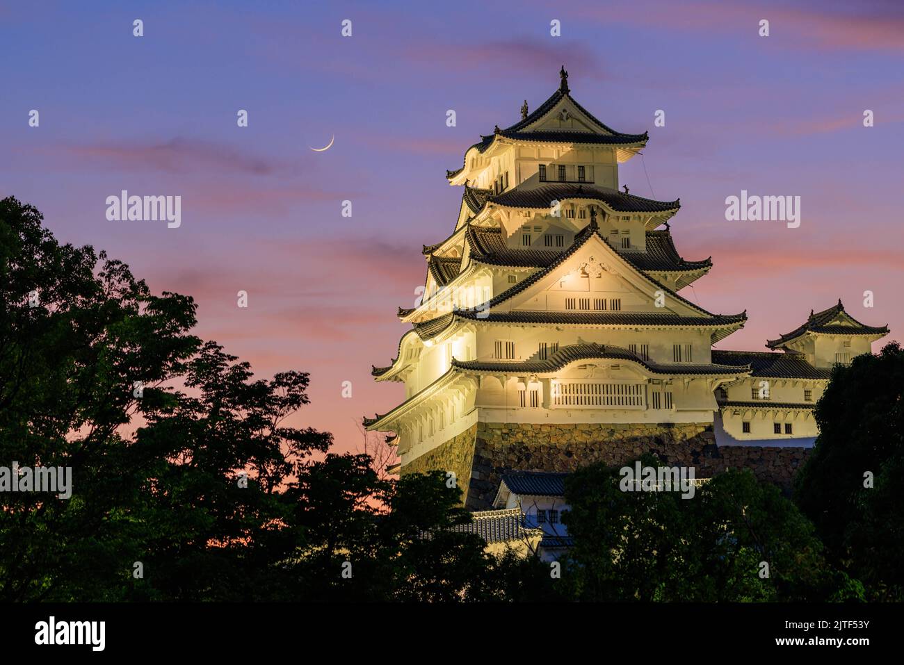 Himeji Castle, one of Japan's famous historic sites, as crescent moon ...