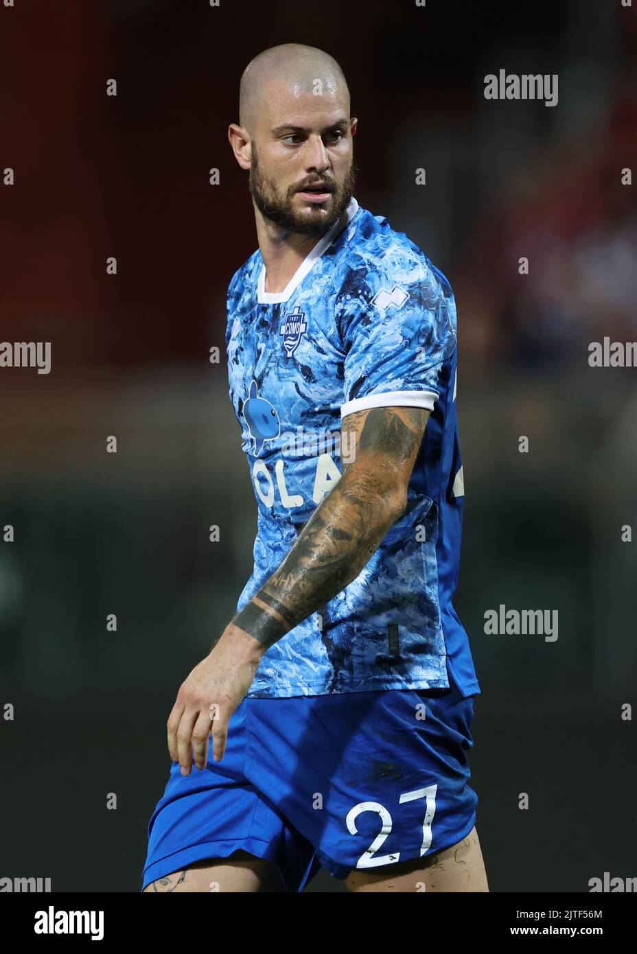Como, Italy, 29th August 2022. Alberto Cerri of Como looks over his ... Como, Italy, 29th August 2022. Alberto Cerri of Como looks over his ...