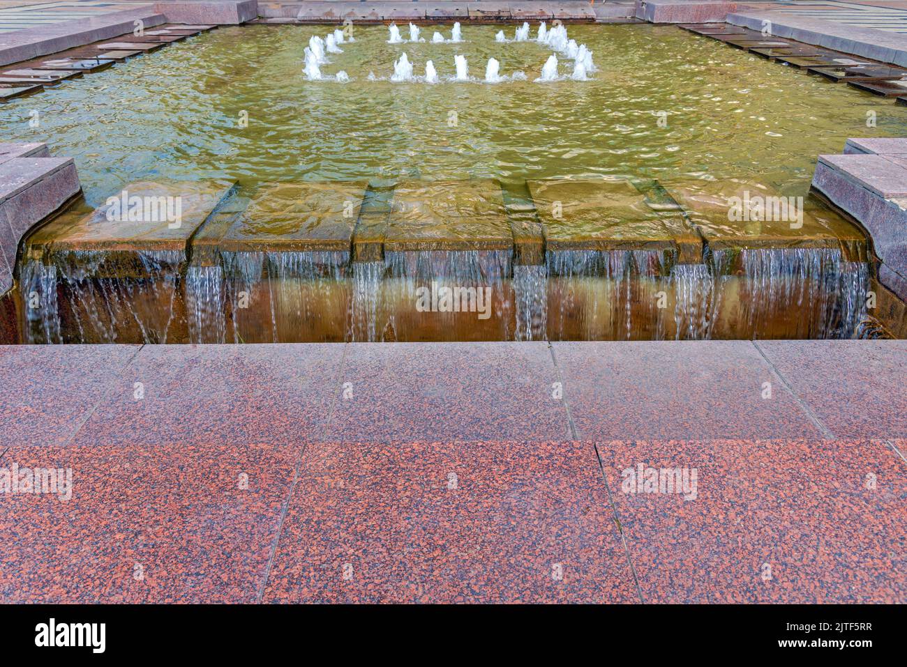 Small Waterfalls Pool Fountain With Green Water City Park Stock Photo ...