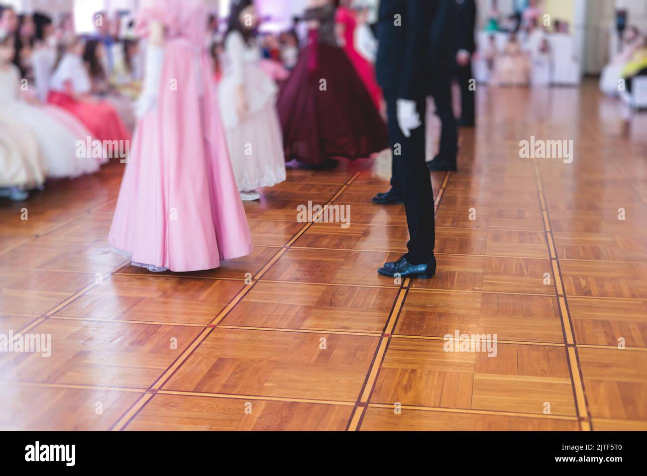 Couples dance on the historical costumed ball in historical dresses ...