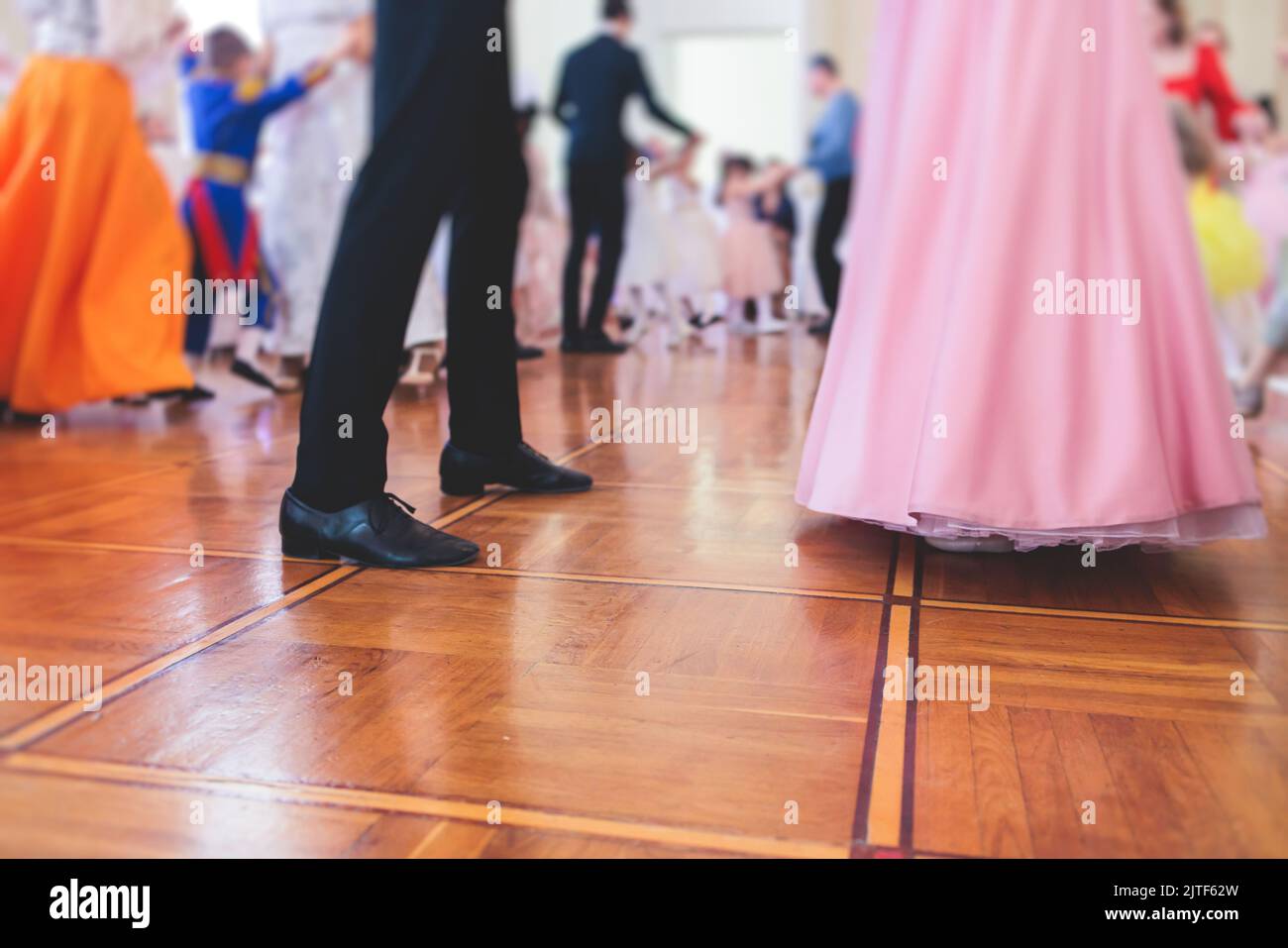 Couples dance on the historical costumed ball in historical dresses ...