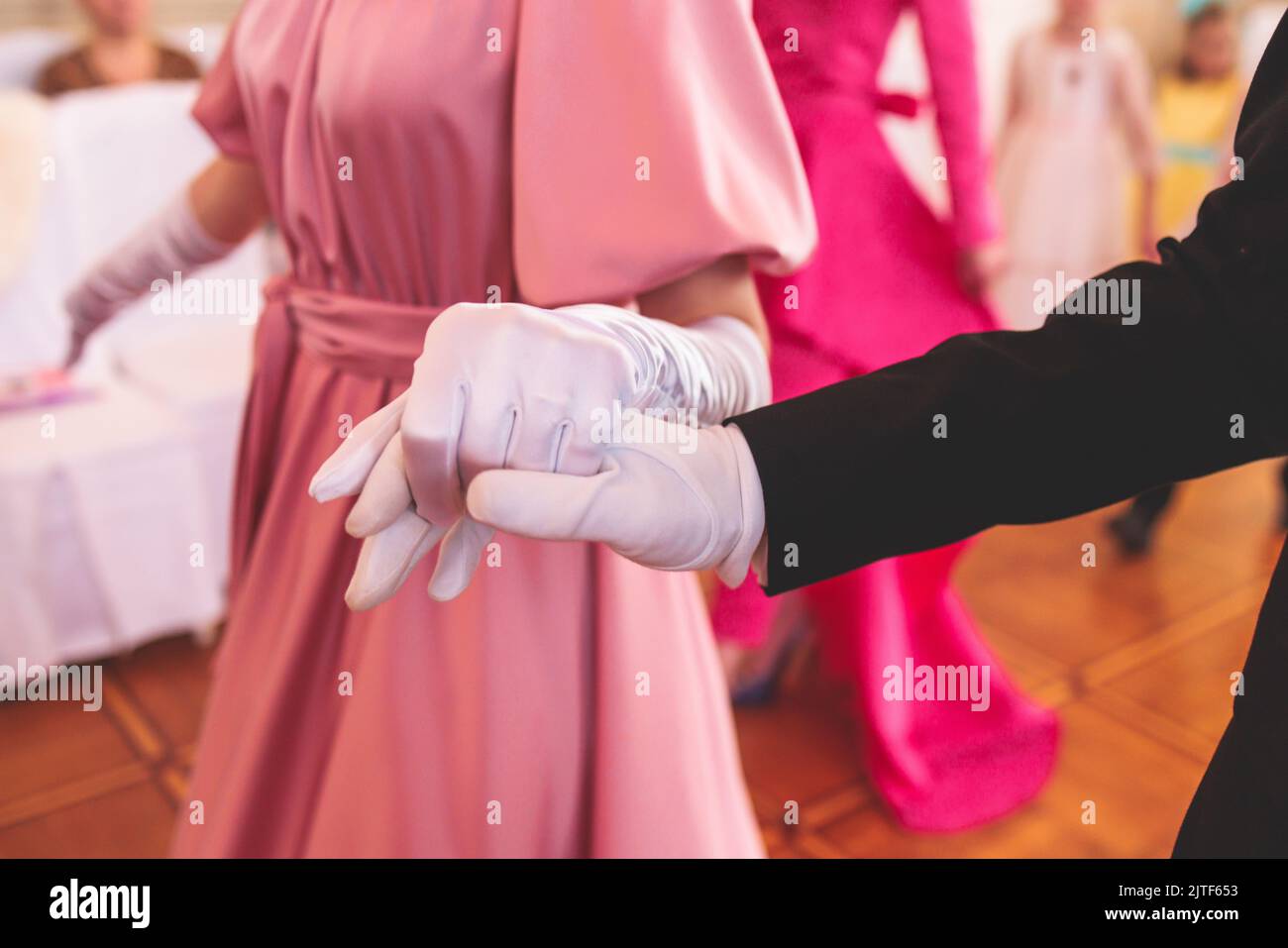 Couples dance on the historical costumed ball in historical dresses ...