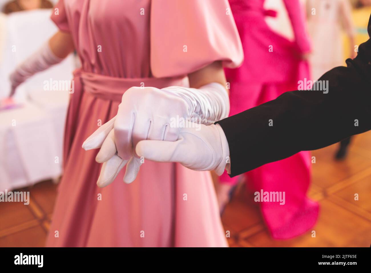 Couples dance on the historical costumed ball in historical dresses ...