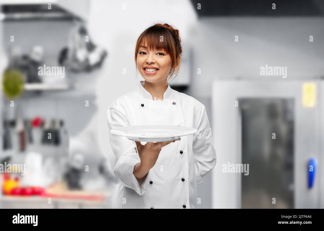 Chef introducing kitchen hi-res stock photography and images - Alamy