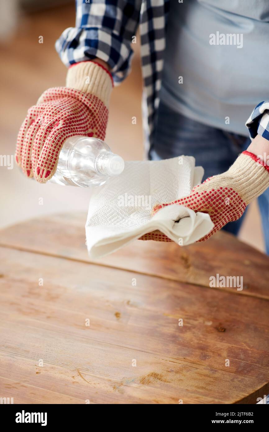woman degreasing old table surface with solvent Stock Photo - Alamy